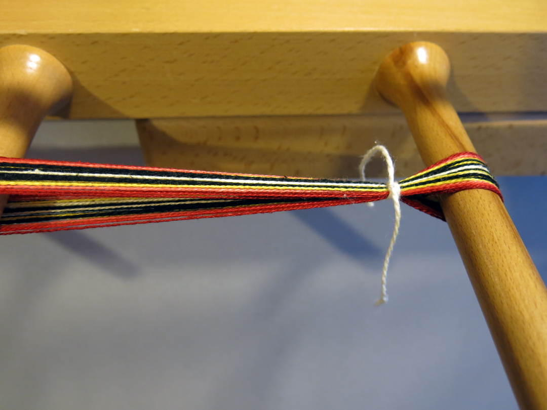 Durham Weaver: Making a warp and threading the 9 pattern slot heddle.