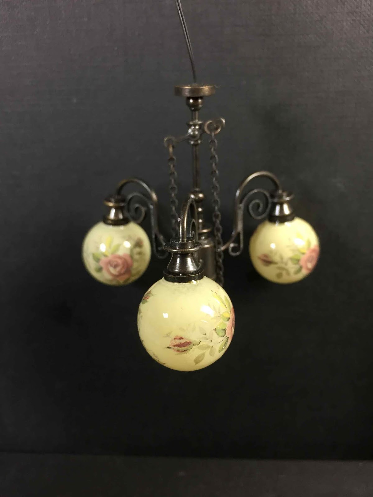 Ray Storey three arm pendant lights