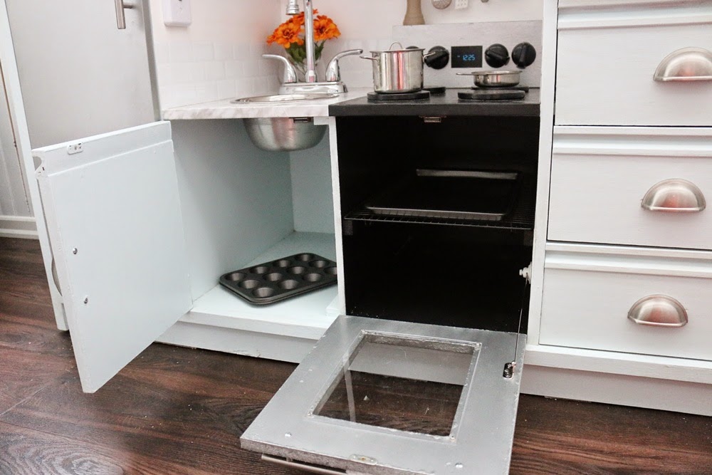 On A Cold Day: DIY Play Kitchen From Old TV Stand!