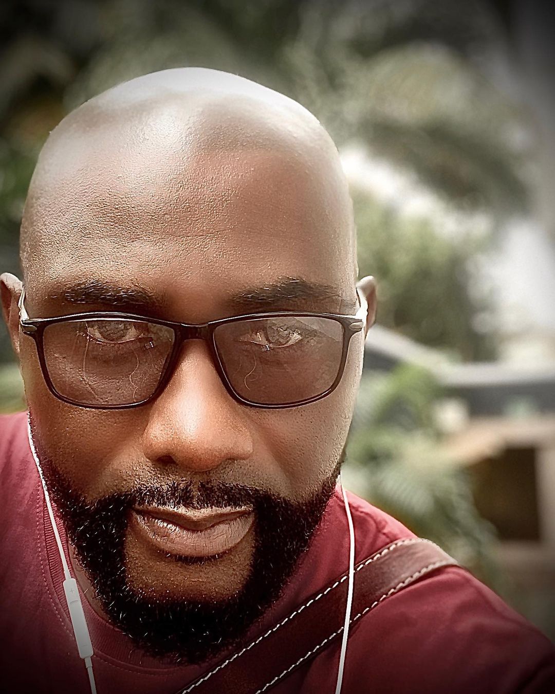 Photos of Anthony Monjaro and his bald hairstyle