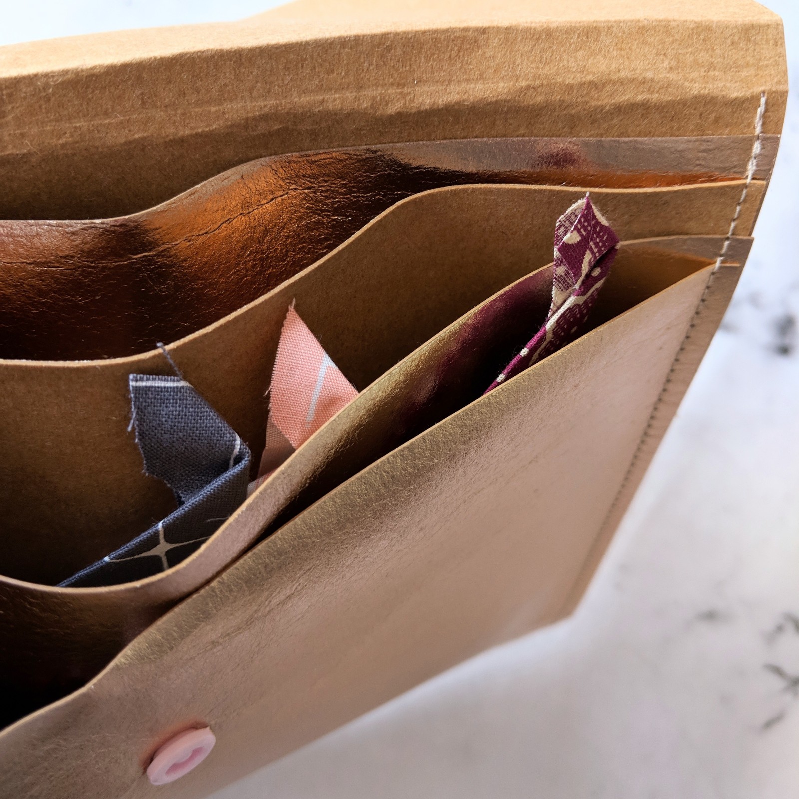 rose gold epp folder / CHARM ABOUT YOU