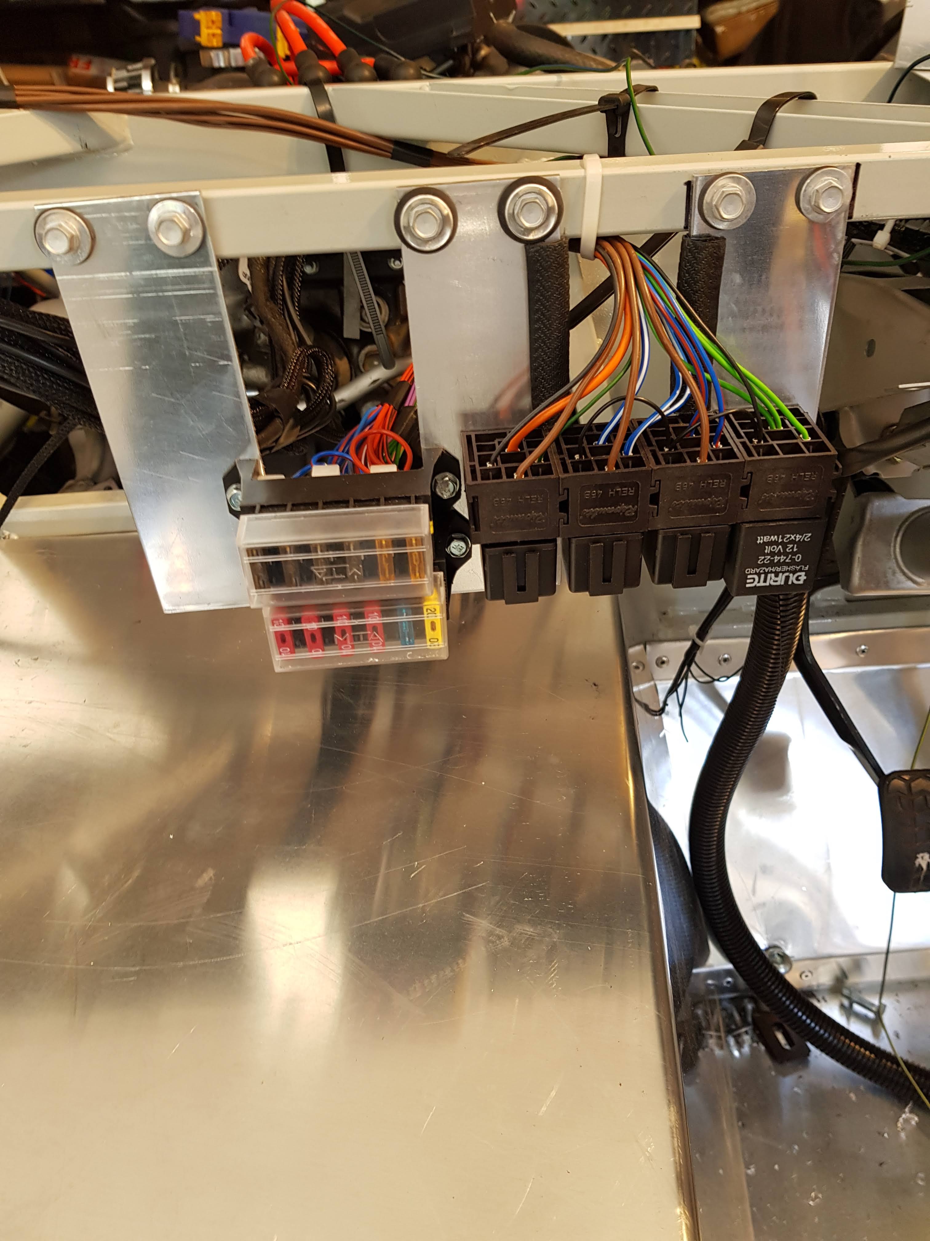 Fuseboxes, Relays and ECU mounting.