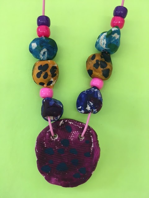 Center School Art: Pattern Necklaces by Grade 1