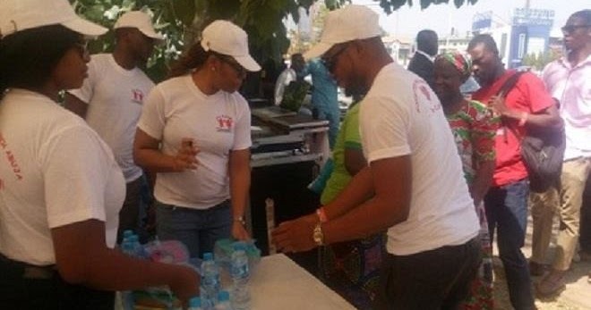 RECESSION: Academy gives 1,500 residents in Abuja free lunch | GIVERS FORUM