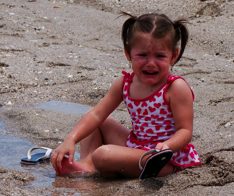 Tamarindo, Costa Rica Daily Photo: Girl crying on the beach