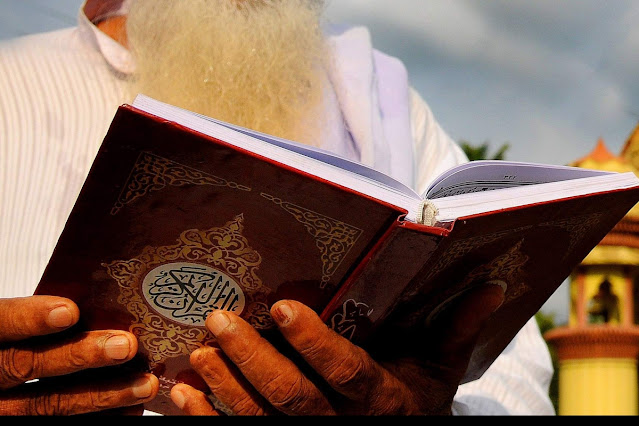 Do Listening to Quran Audio and Reading It Have the Same Reward