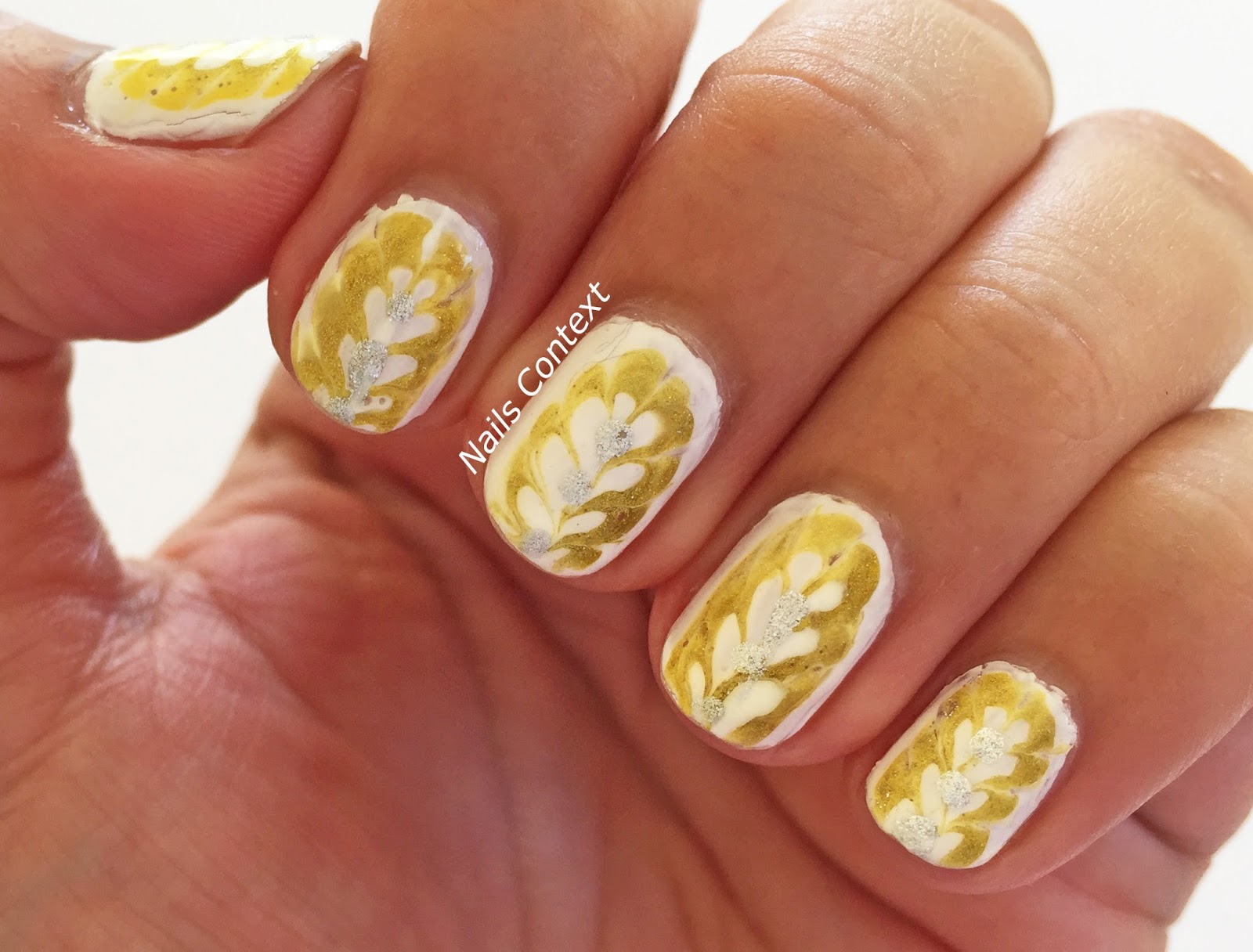Nails Context: Yellow Drag Marble Nails