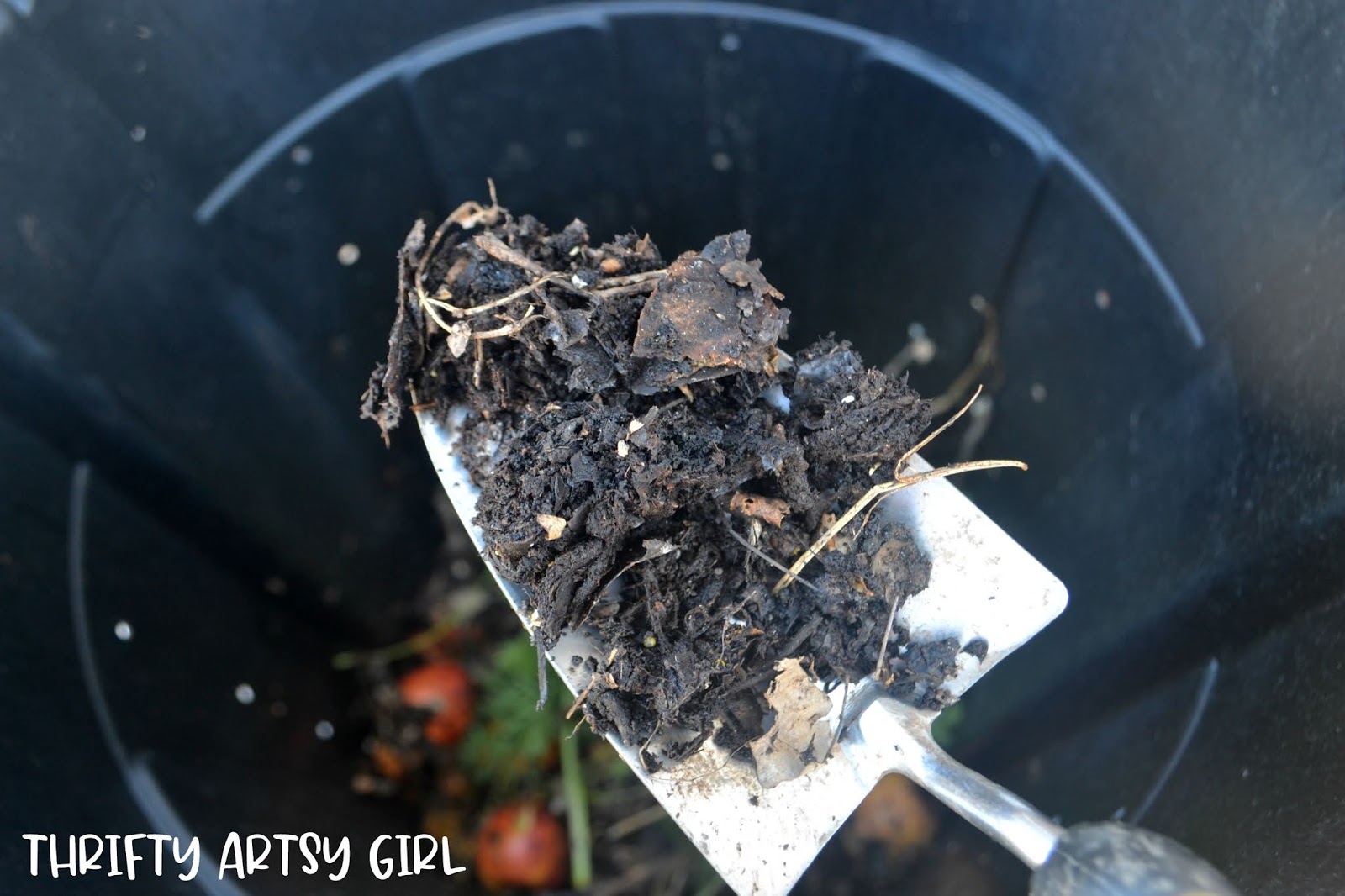 Thrifty Artsy Girl: How to Make a Compost Bin from a $9 Garbage Can