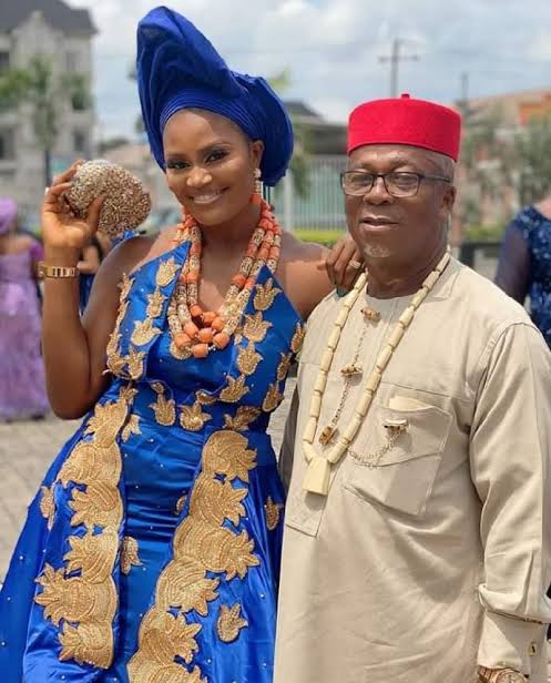 Photo of Chizzy Alichi and her father