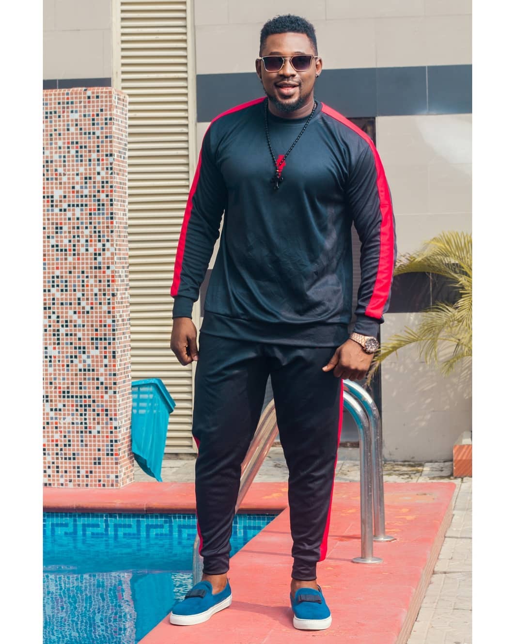 Photos of Daniel K Daniel standing tall