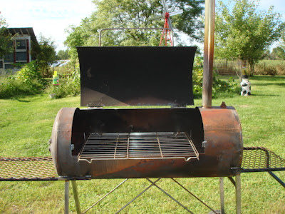 Ed's Metal Creations: Homemade Charcoal or Wood Grill from Hot Water Tank