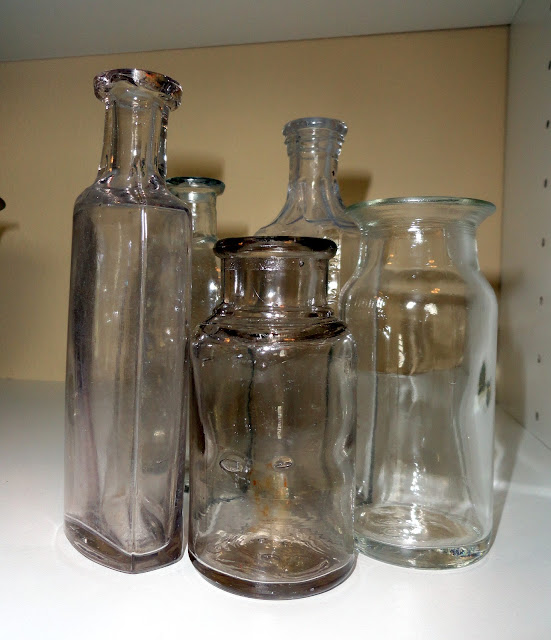 Painted glass jars with mod podge poison labels