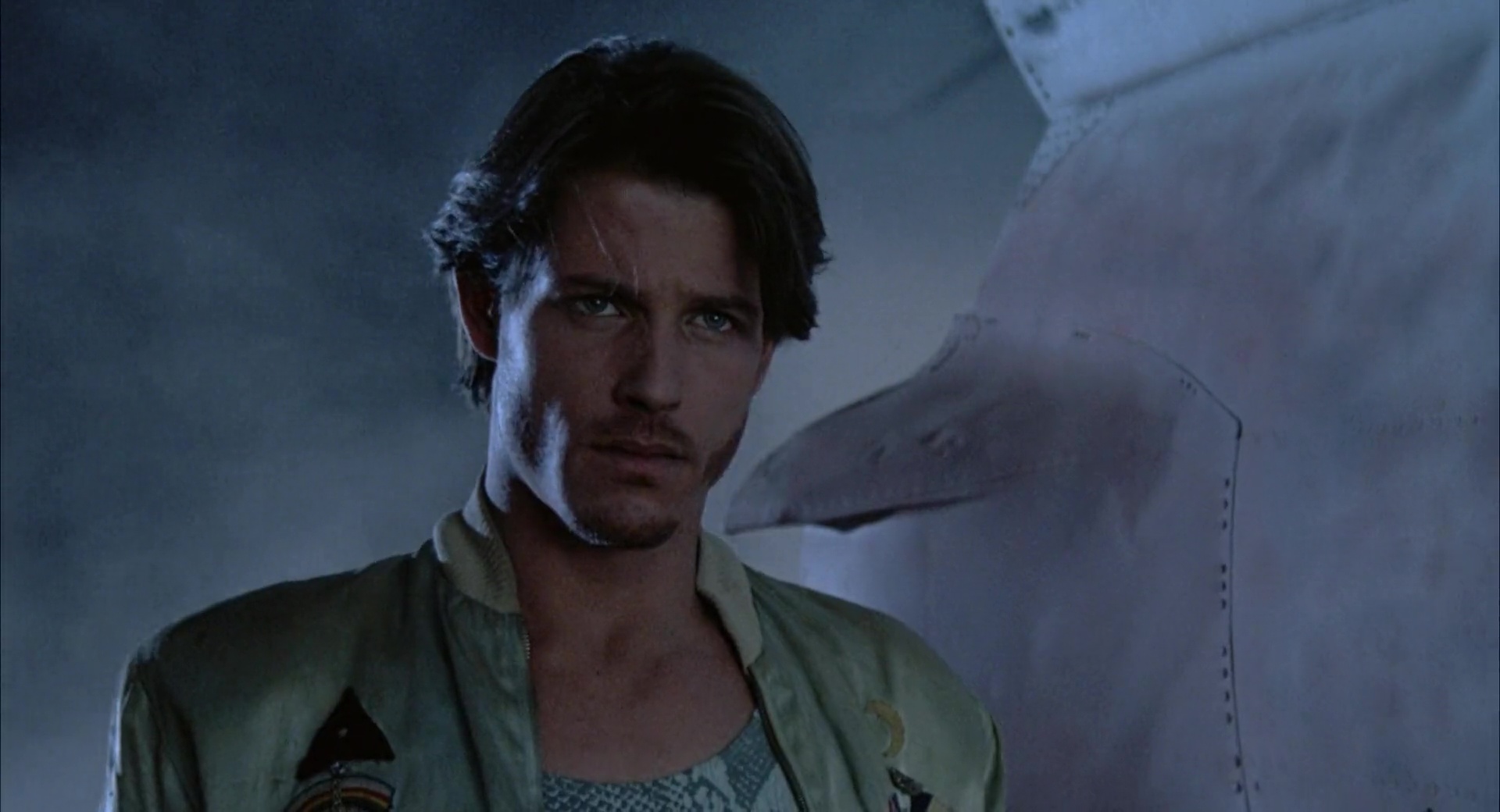 ausCAPS: Michael Paré shirtless in World Gone Wild