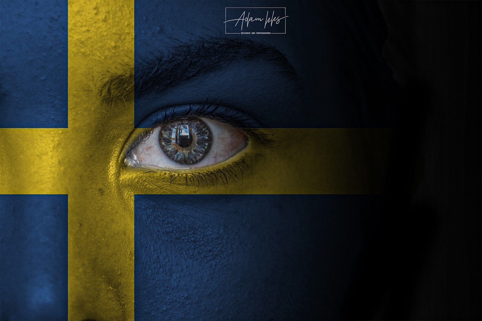 Photo of the flag of Sweden on the face of a Child background