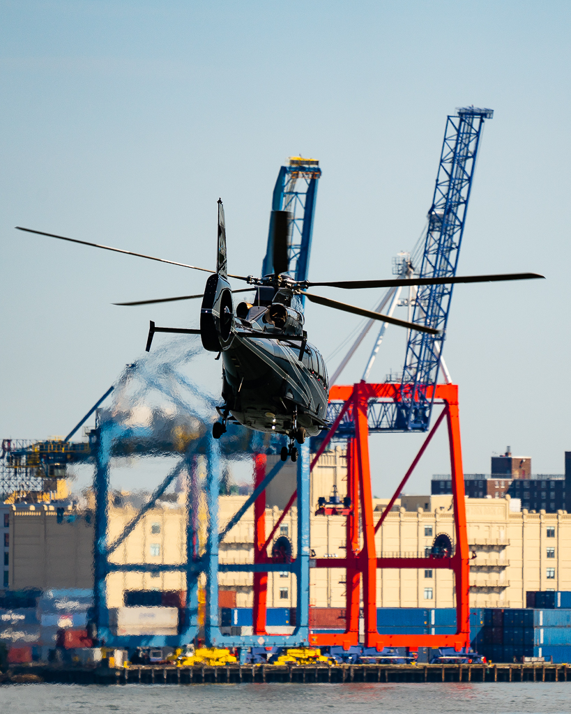 Light Happens: Black Helicopter With Cranes