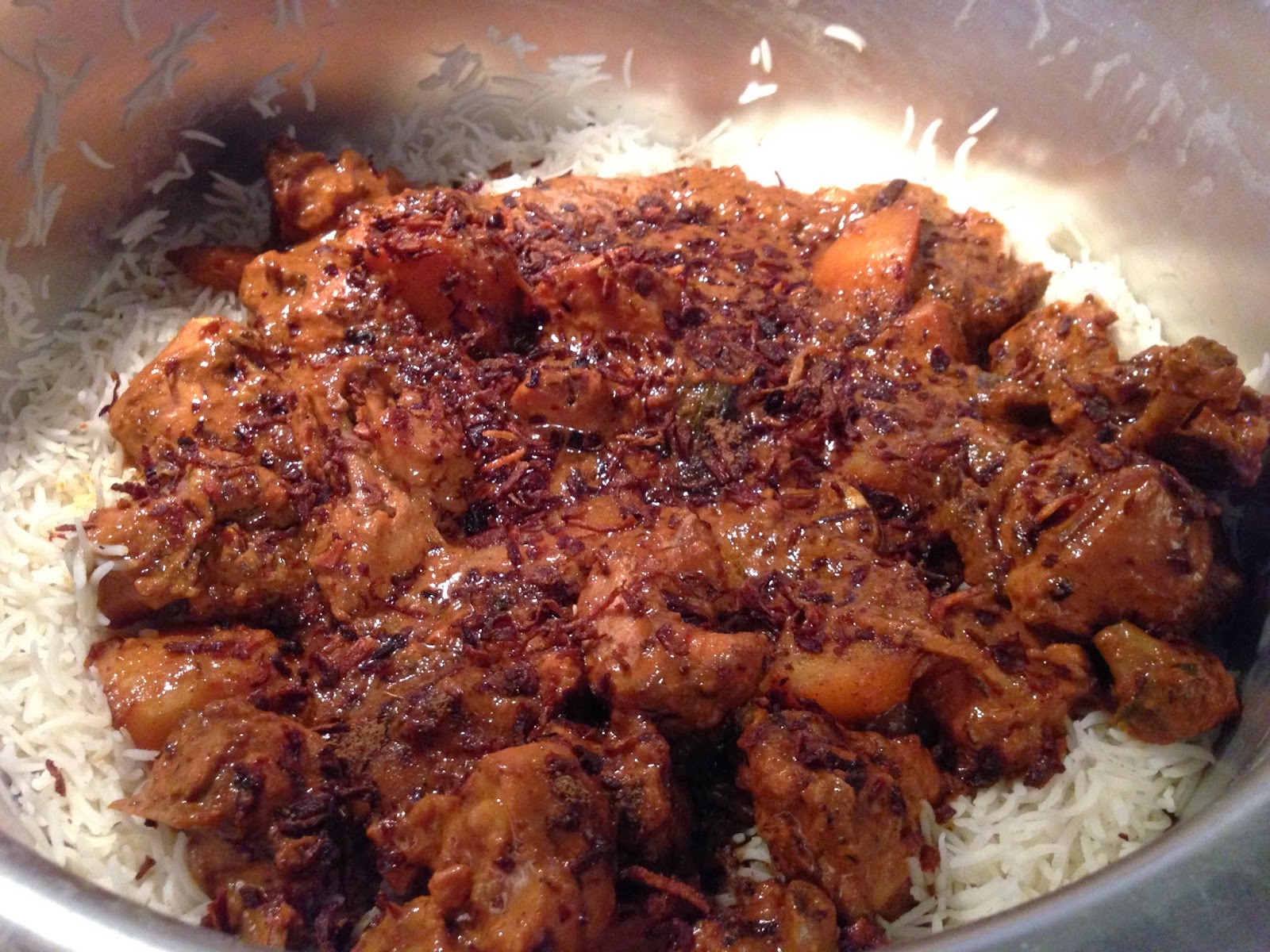 Achi Gori Bivi: Chicken Biryani (Flavorful Rice & Chicken dish)