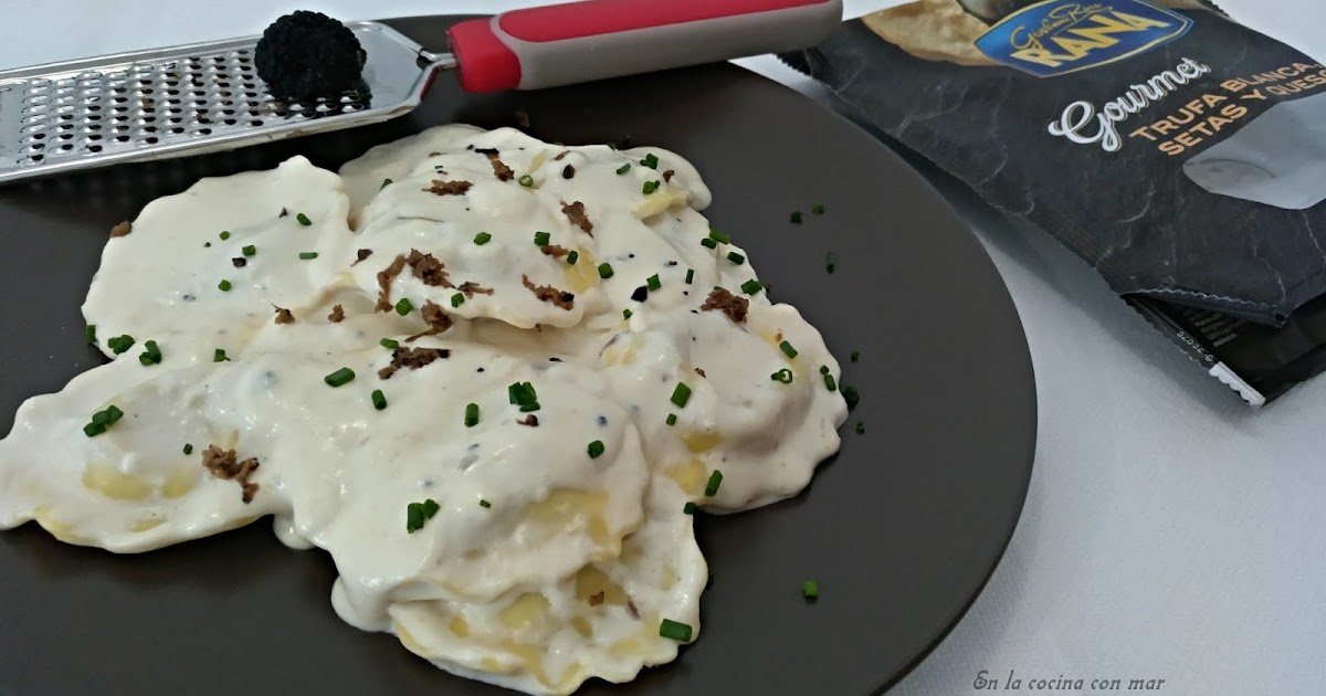 Tortellinis de trufa blanca, setas y queso con salsa de parmesano