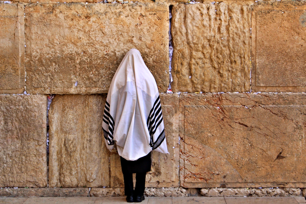 Reciting a Brief Prayer at the Wailing Wall in Jerusalem | Israel ...