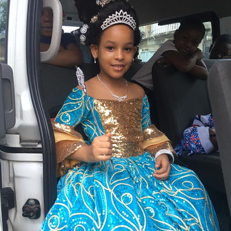 Pretty Princess Sherin Griggs poses inside car