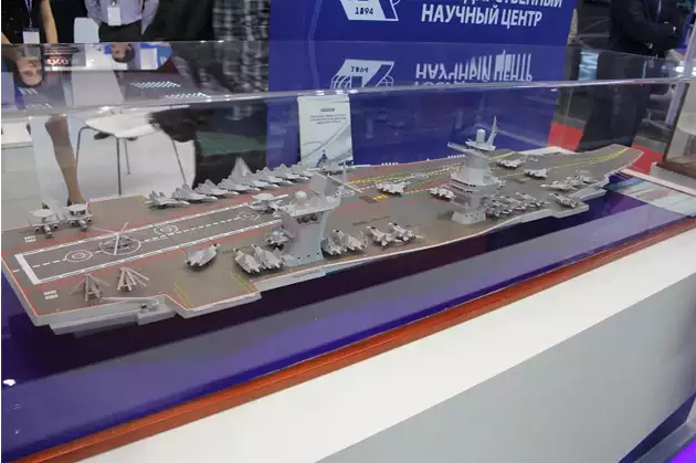 DEFENSE STUDIES: Putin Takes a Look at New Aircraft Carrier