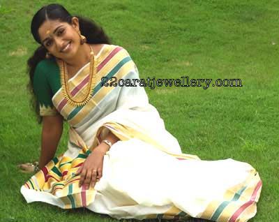 Kavya Madhavan in White Traditional Saree - Saree Blouse Patterns