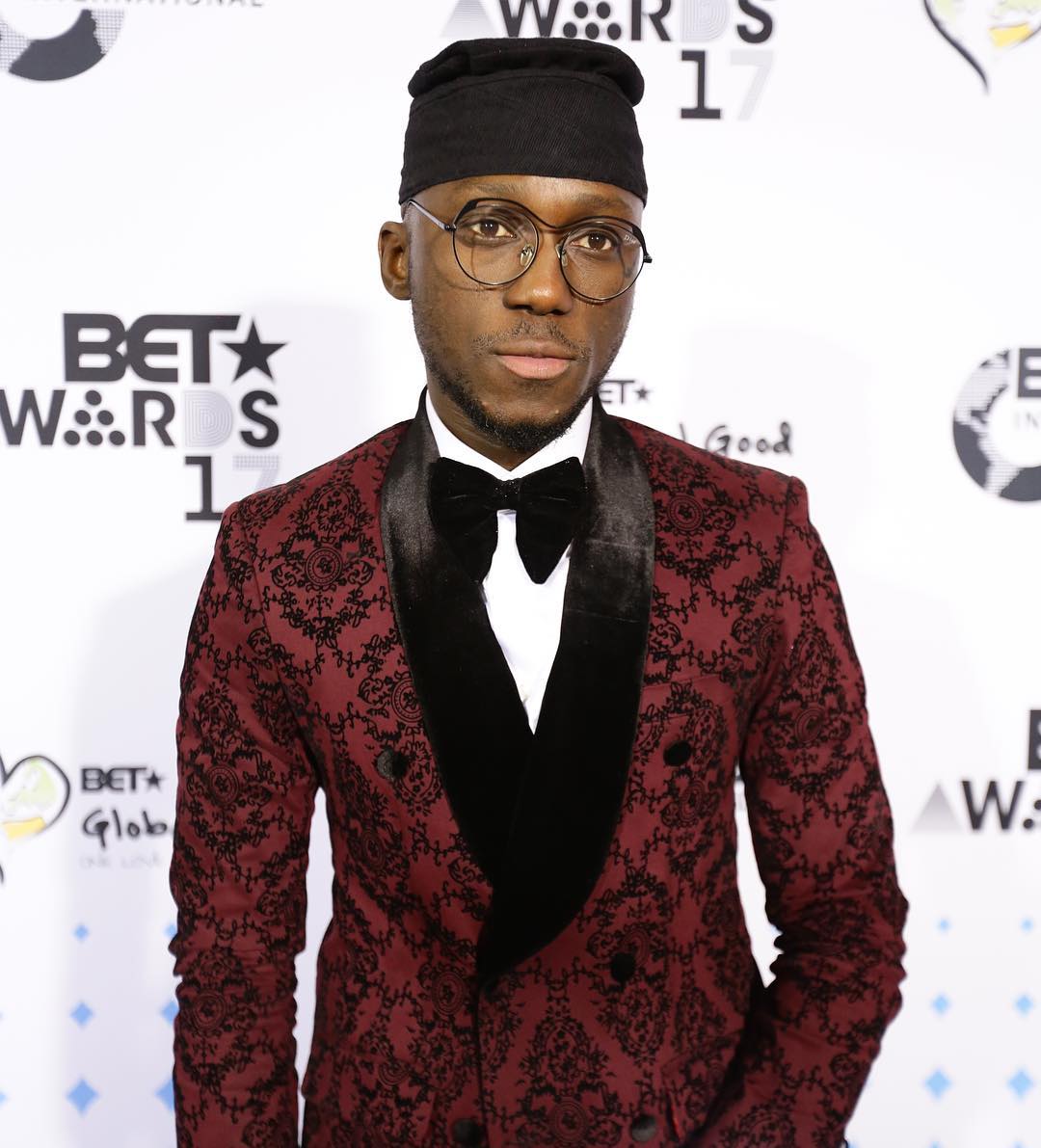 Who is the father of DJ Spinall?