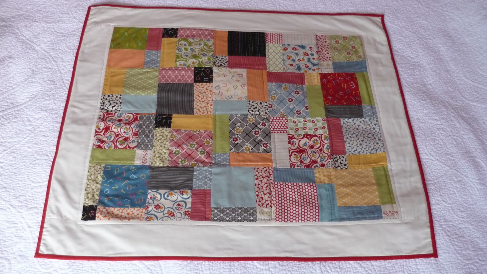 Mown: Disappearing Nine Patch Baby Quilt