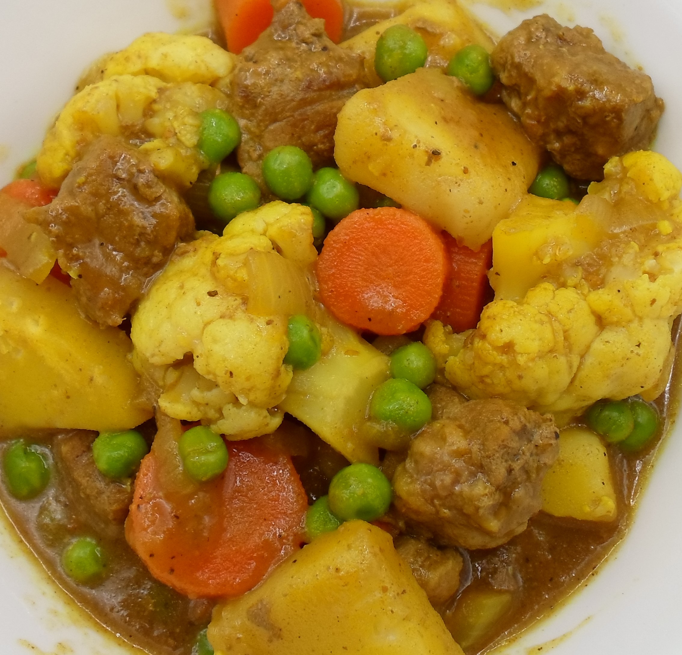 Happier Than A Pig In Mud: Curried Beef Stew with Cauliflower and Peas ...