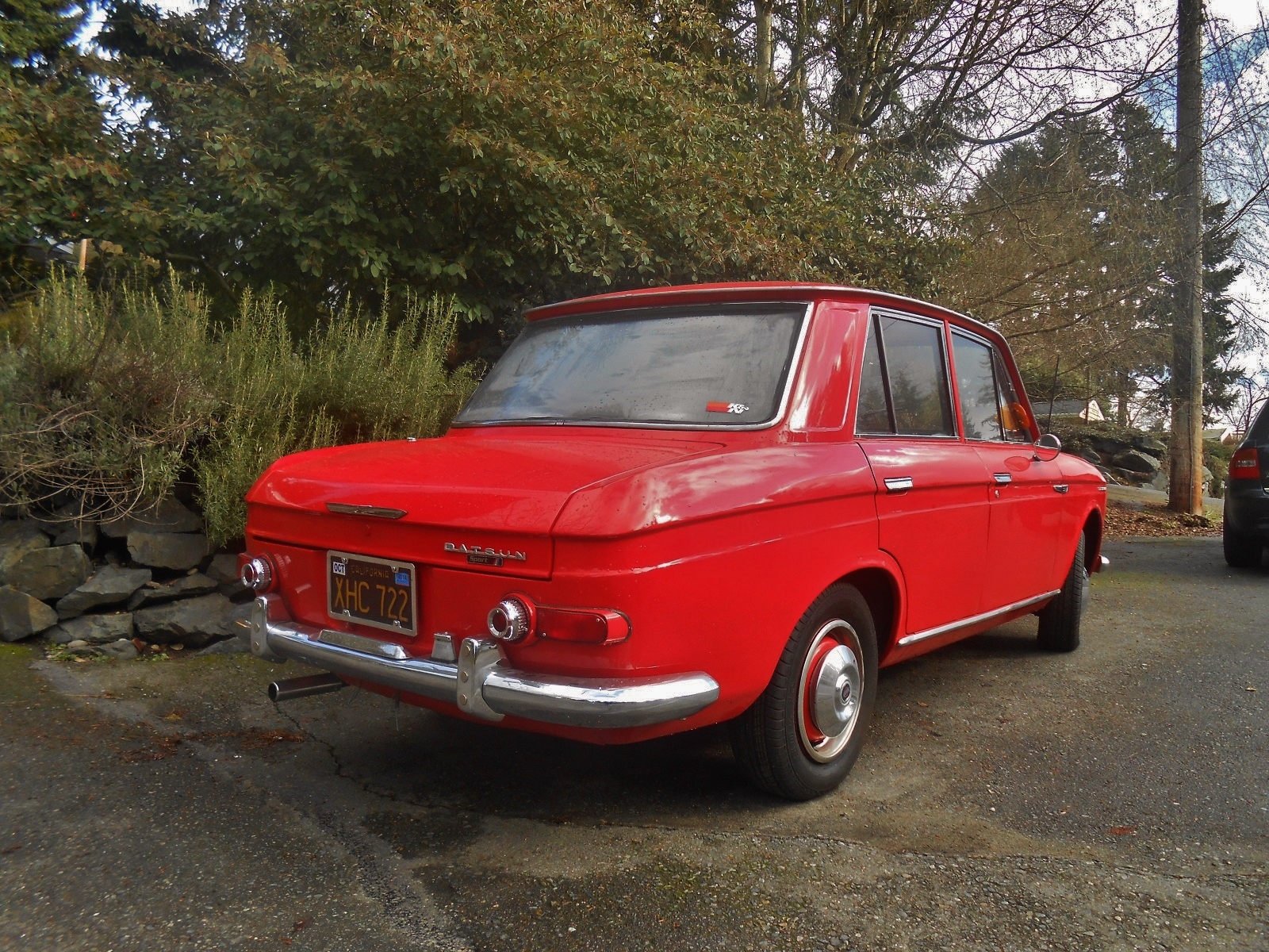 Seattle's Parked Cars: 1966 Datsun 411 Sedan