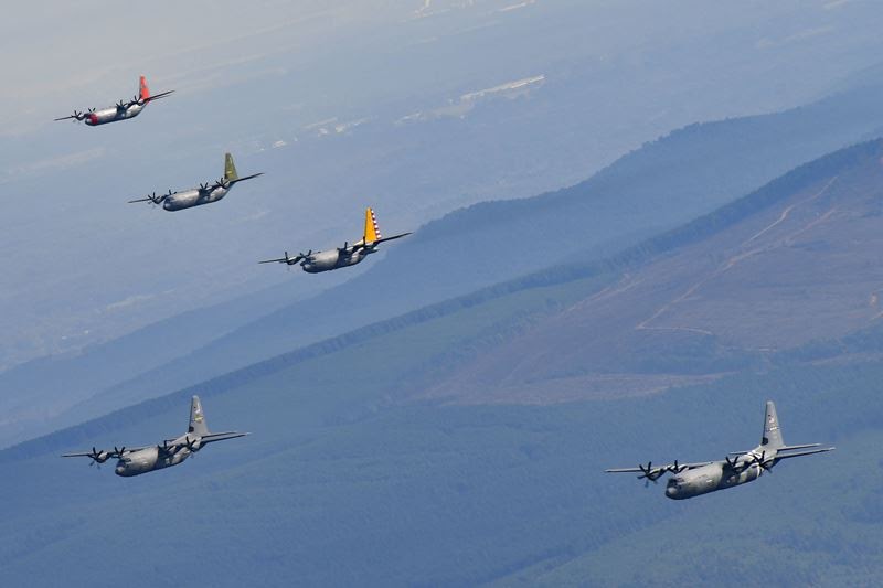 Epic formation composed of 5 C-130s and a C-47 Skytrain flies over ...