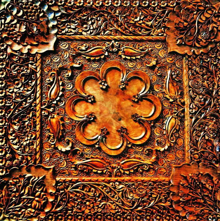 Hand carved walnut wood panel