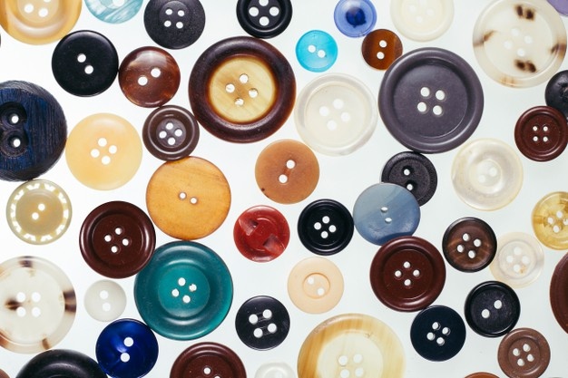 El cuaderno de piedra : EL JUEGO DE LOS BOTONES