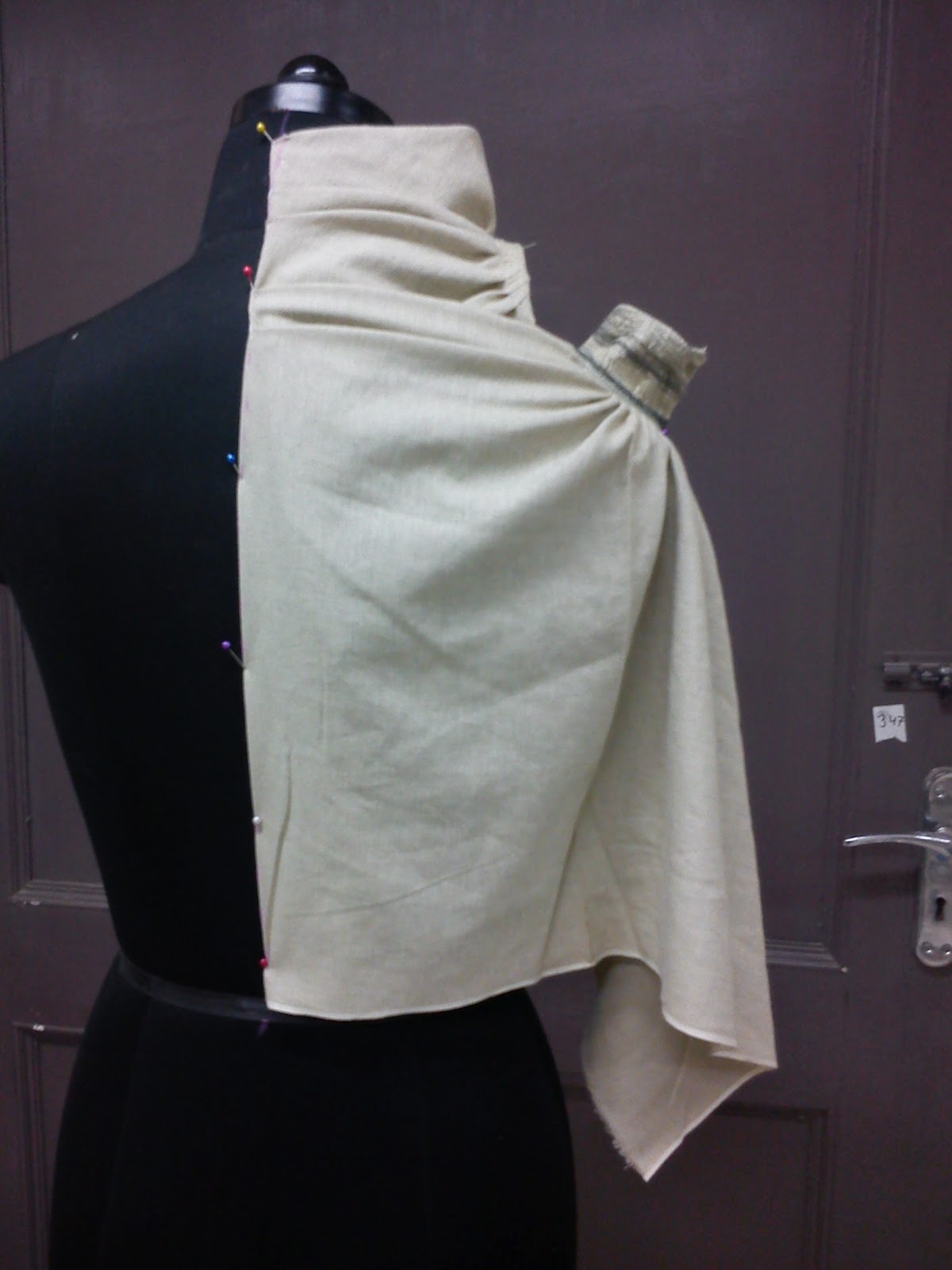 design and surface texture: fabric texture taking shape of garment elements