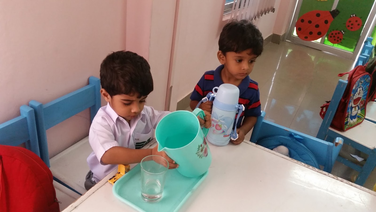 Red Little stars: EPL activity (water pouring and mopping activity)