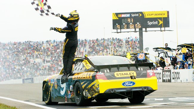 Marcos Ambrose Claimed his maiden NASCAR Sprint Cup win - IndiDot