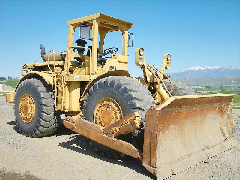 Tratores e Máquinas: Trator de rodas Caterpillar (porcão)