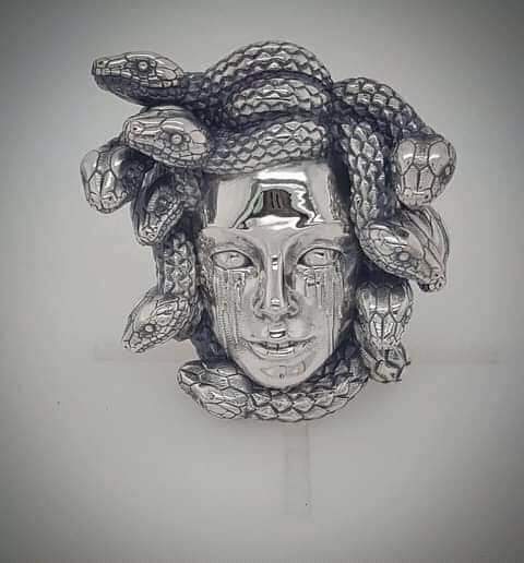 THE SECRET MEANING BEHIND THE VERSACE LOGO