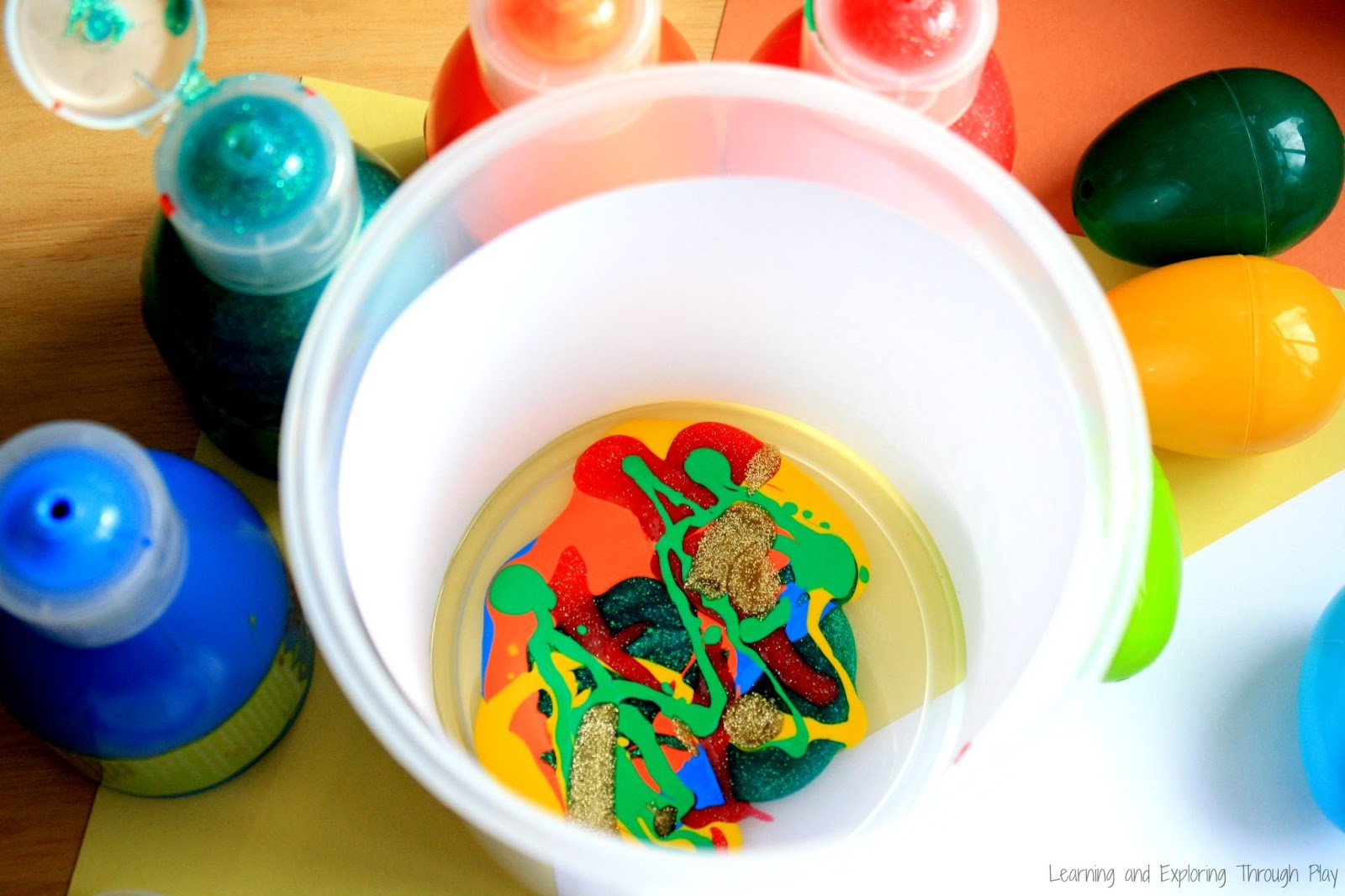 Learning and Exploring Through Play: Easter Shake Process Art