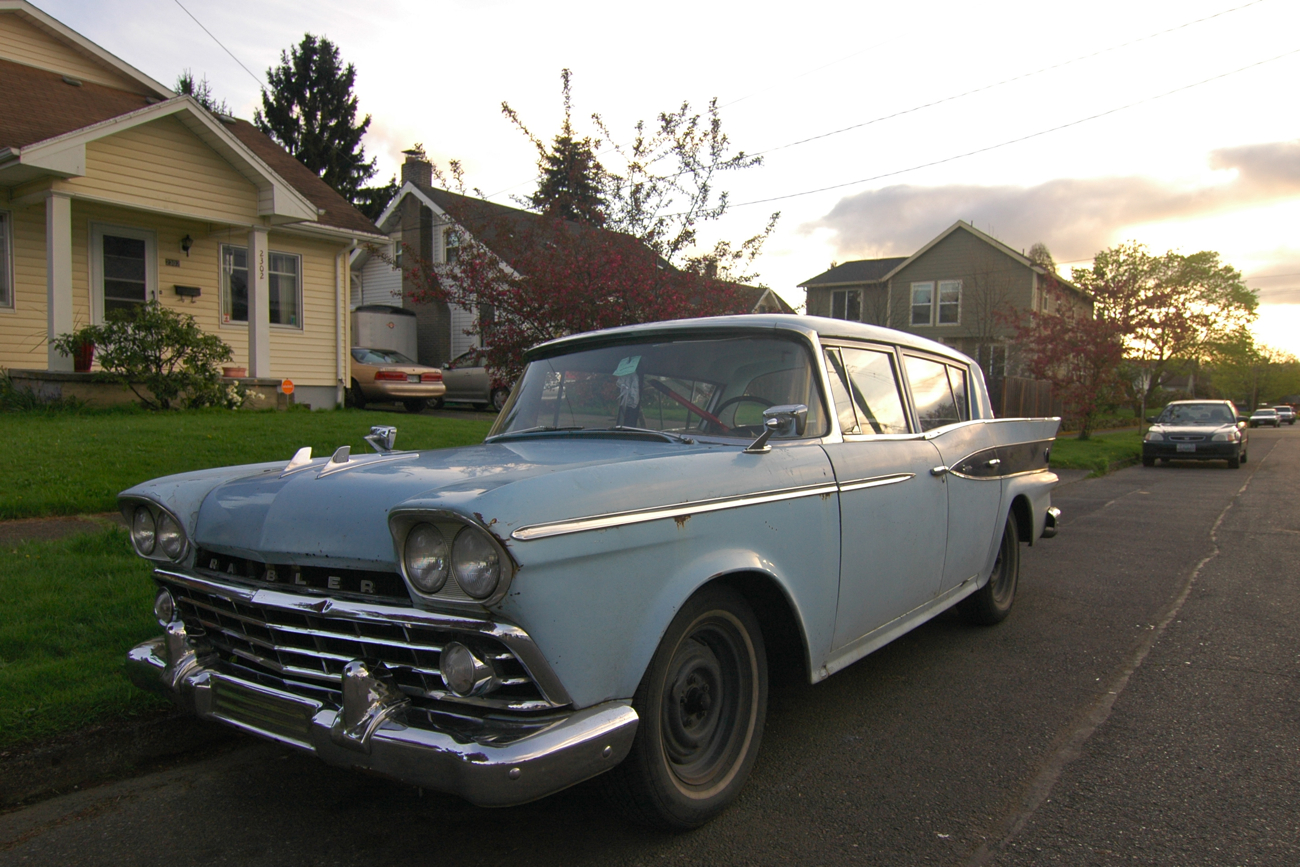 OLD PARKED CARS.: 1959 Rambler Six Super Sedan.