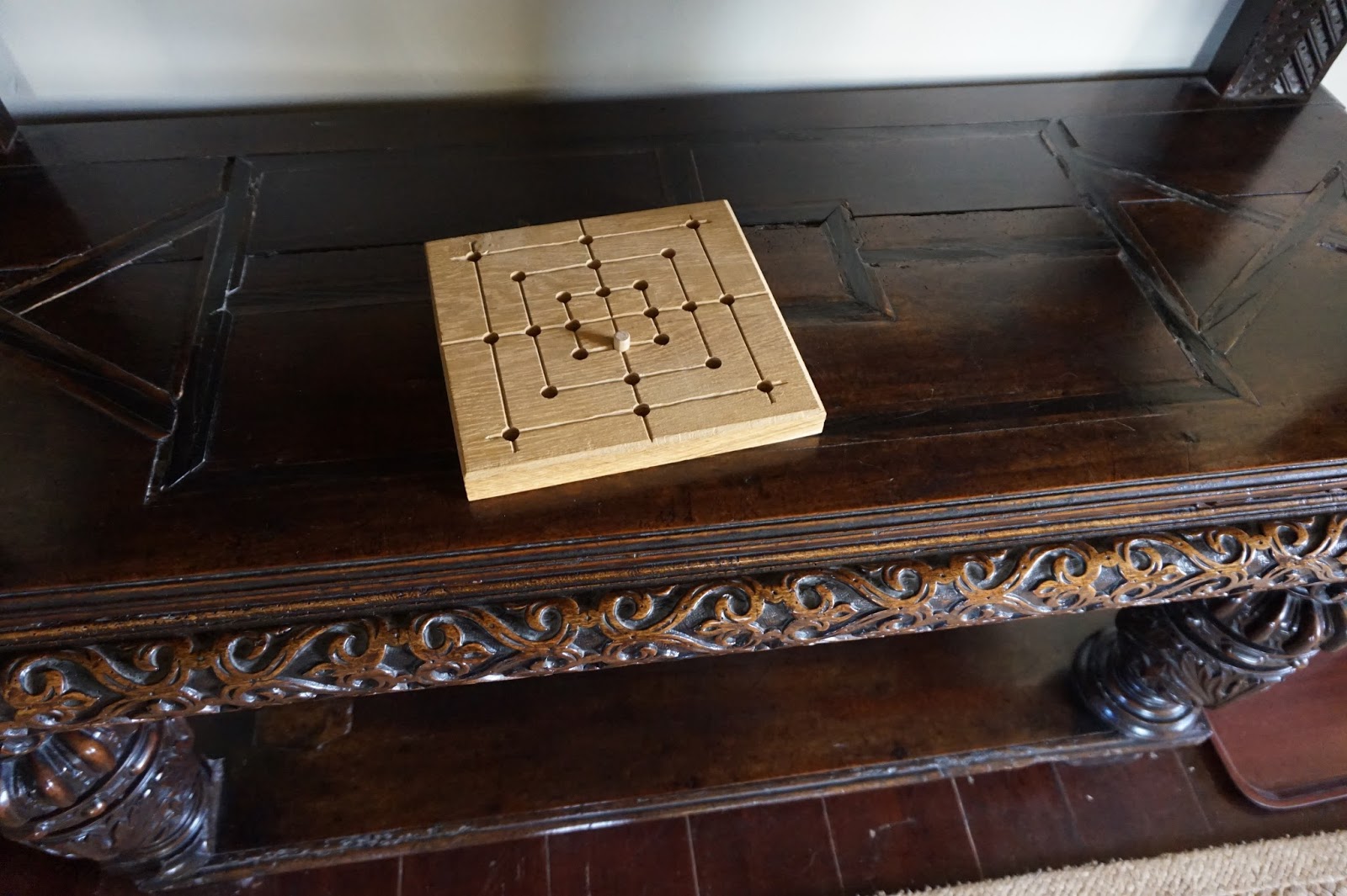 A Mathematical History Tour: Nine Men's Morris Game