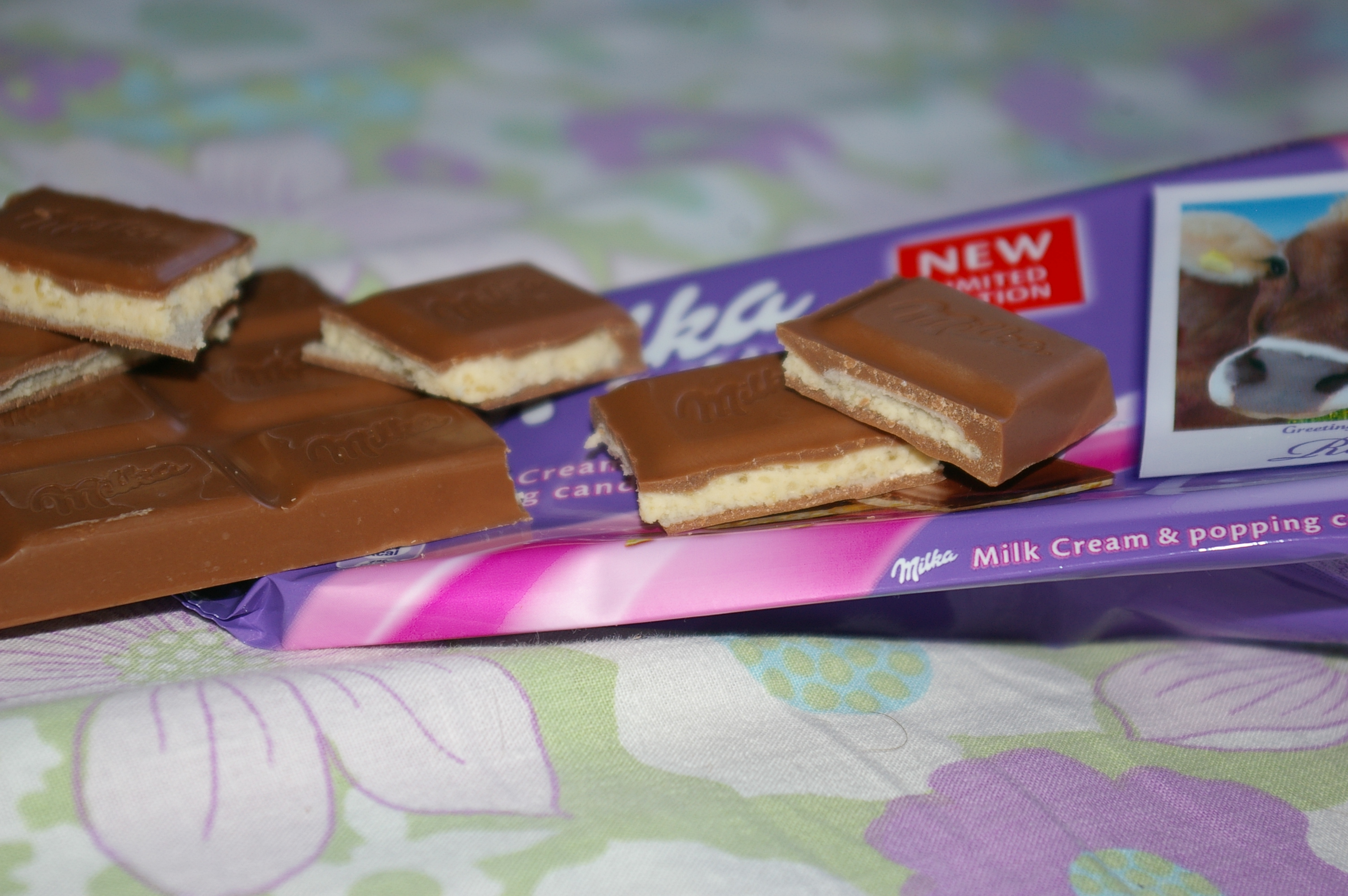 Milka Cream & Popping candies - Млечен шоколад с млечен пължен и пукаща ...