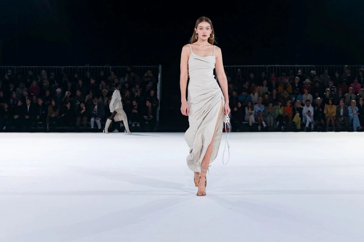 Bella and Gigi Hadid take the Jacquemus Menswear Paris Fashion Week by storm in sultry gowns