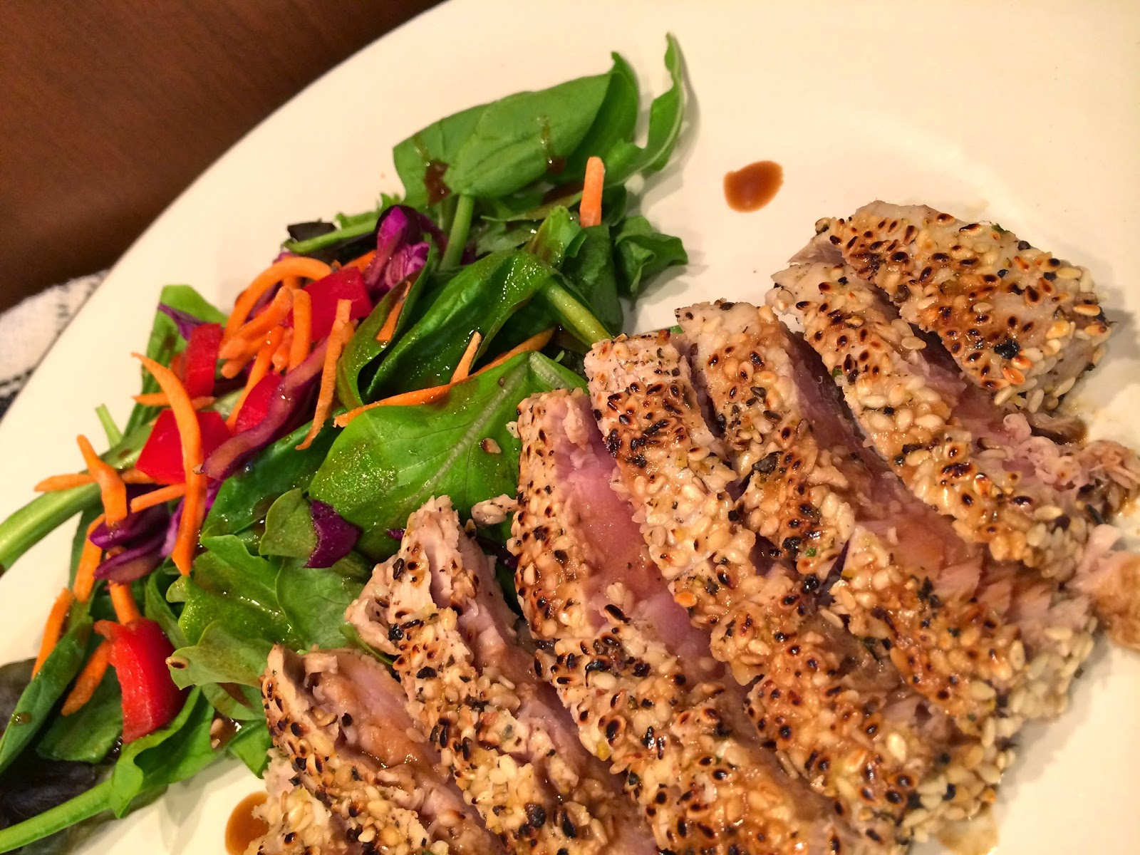Sesame pepper tuna steak with a wasabi soy dressing