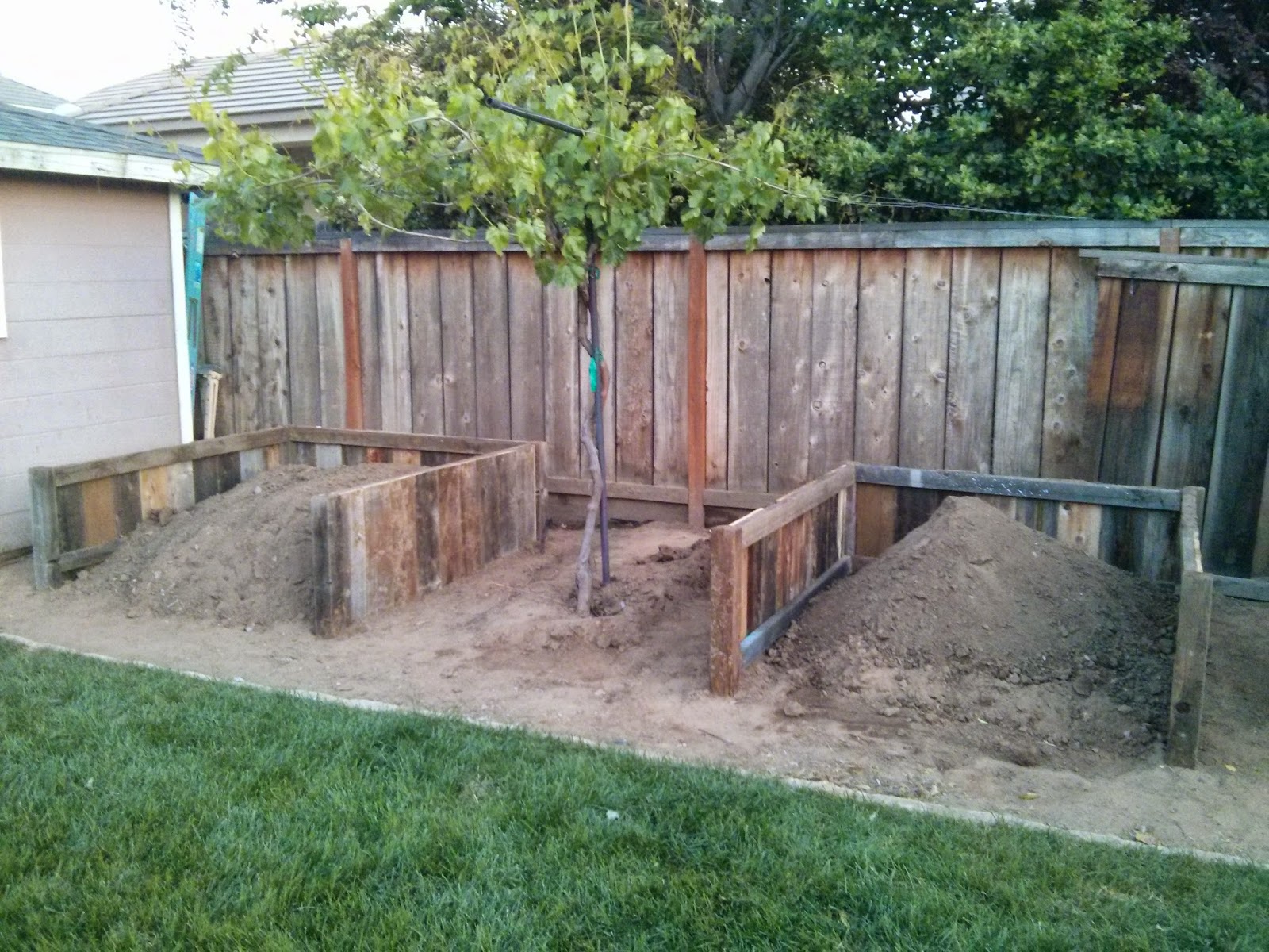 Farley Style: Fence repourposed into compost bins
