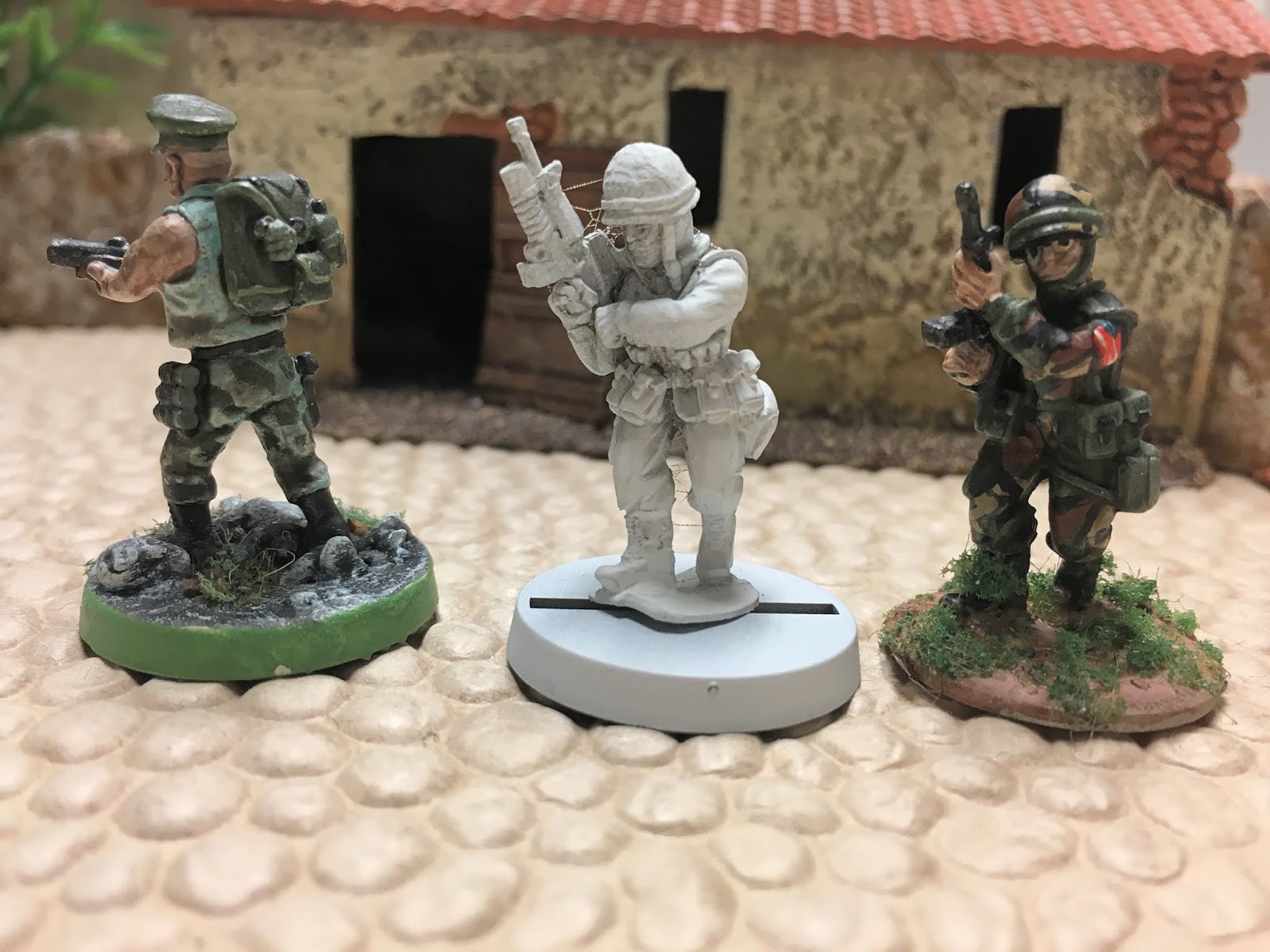 28mm USMC with some Pulp 80s miniatures