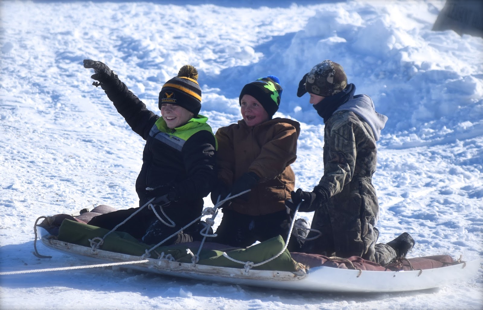 Dashing Through These Days Sledding