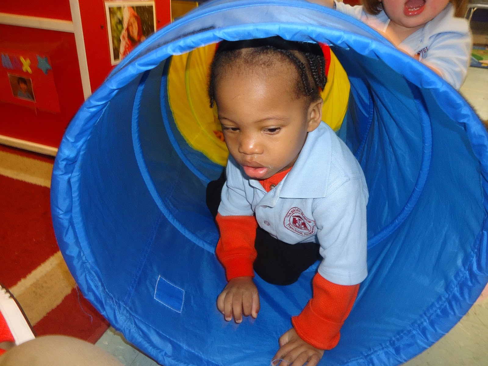 Welcome to the HH Toddler Classroom!: Crawling through the tunnel