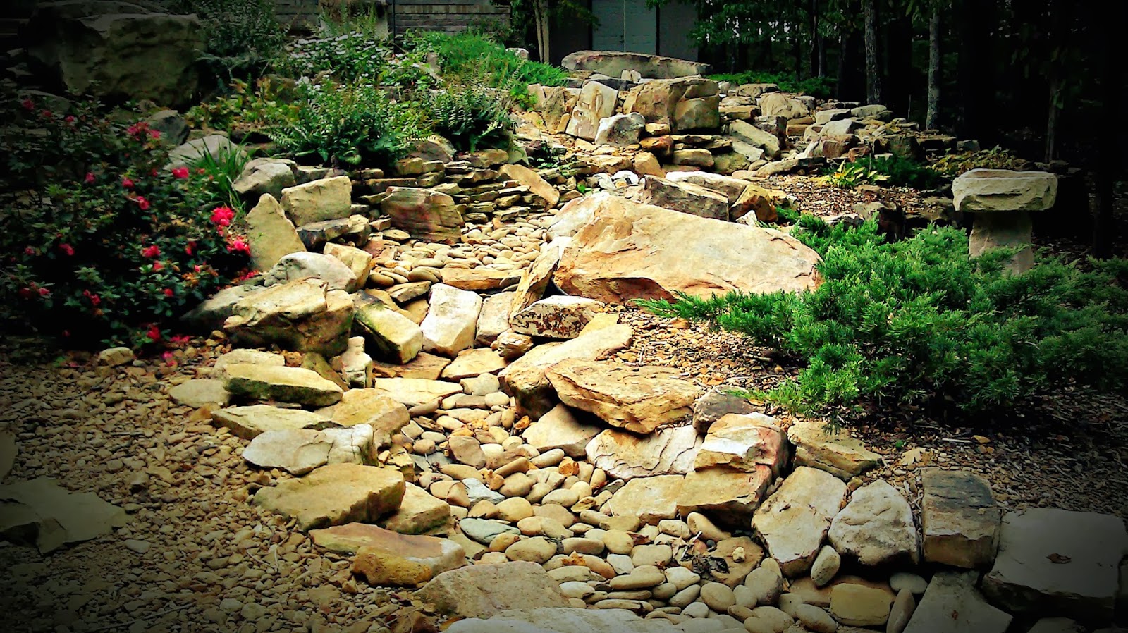 Visionary Aquatic Designs: Stone stream with waterfall, fire-pit and deck.