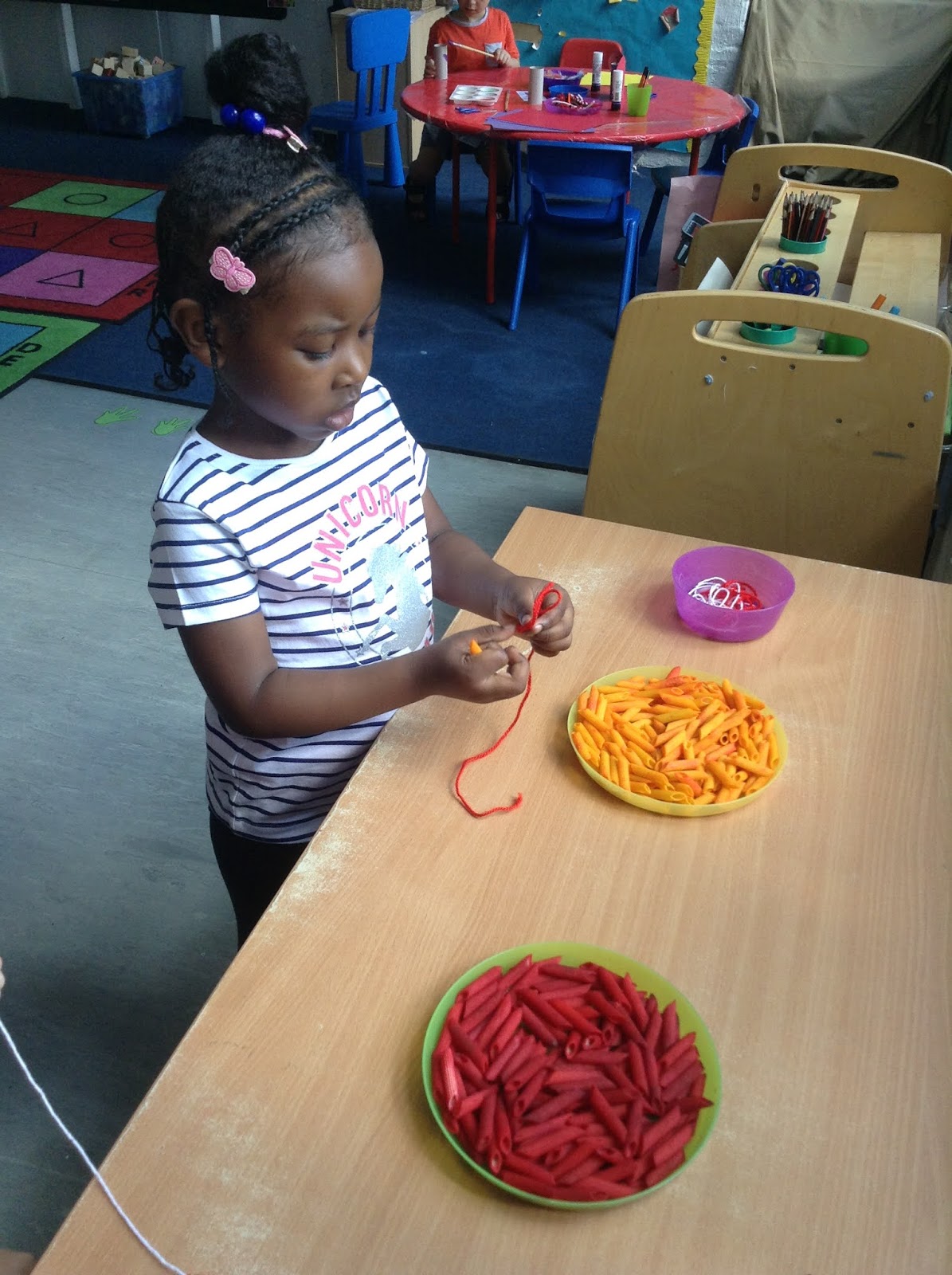 Early Years: Caterpillar Necklace Threading