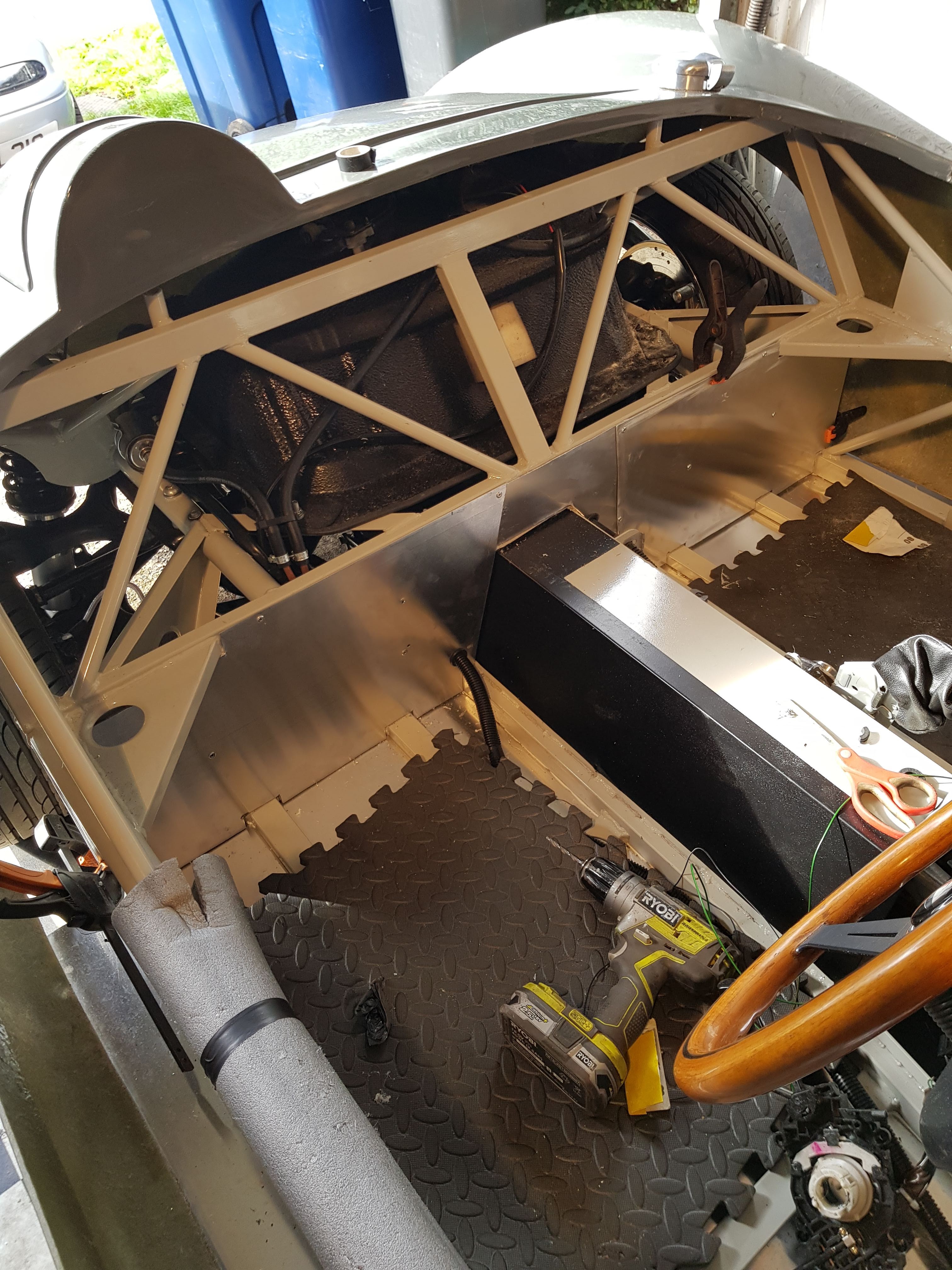 Lower rear bulkhead panels and handbrake fittings